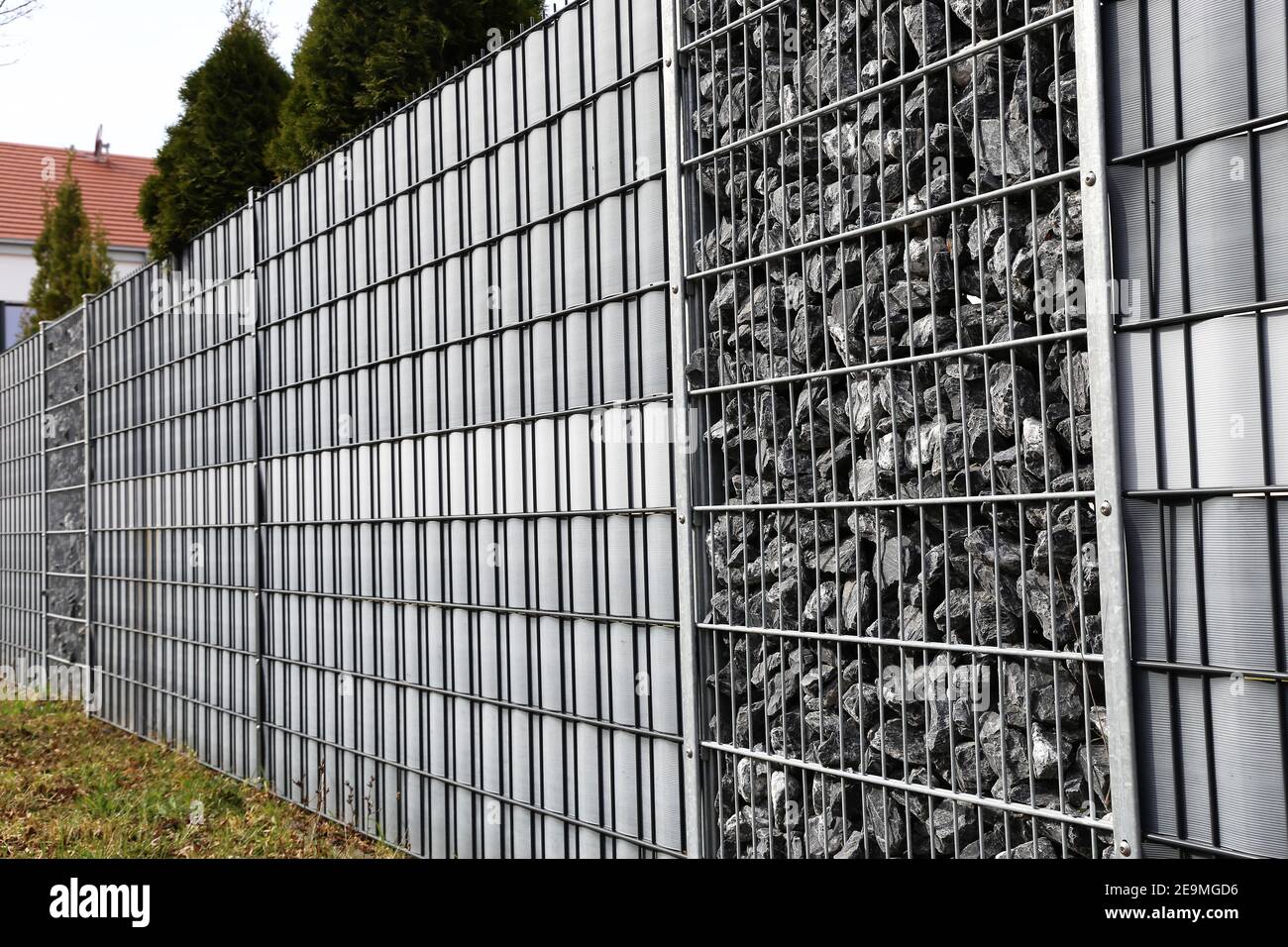 Modern new privacy fence as a boundary of the property Stock Photo - Alamy