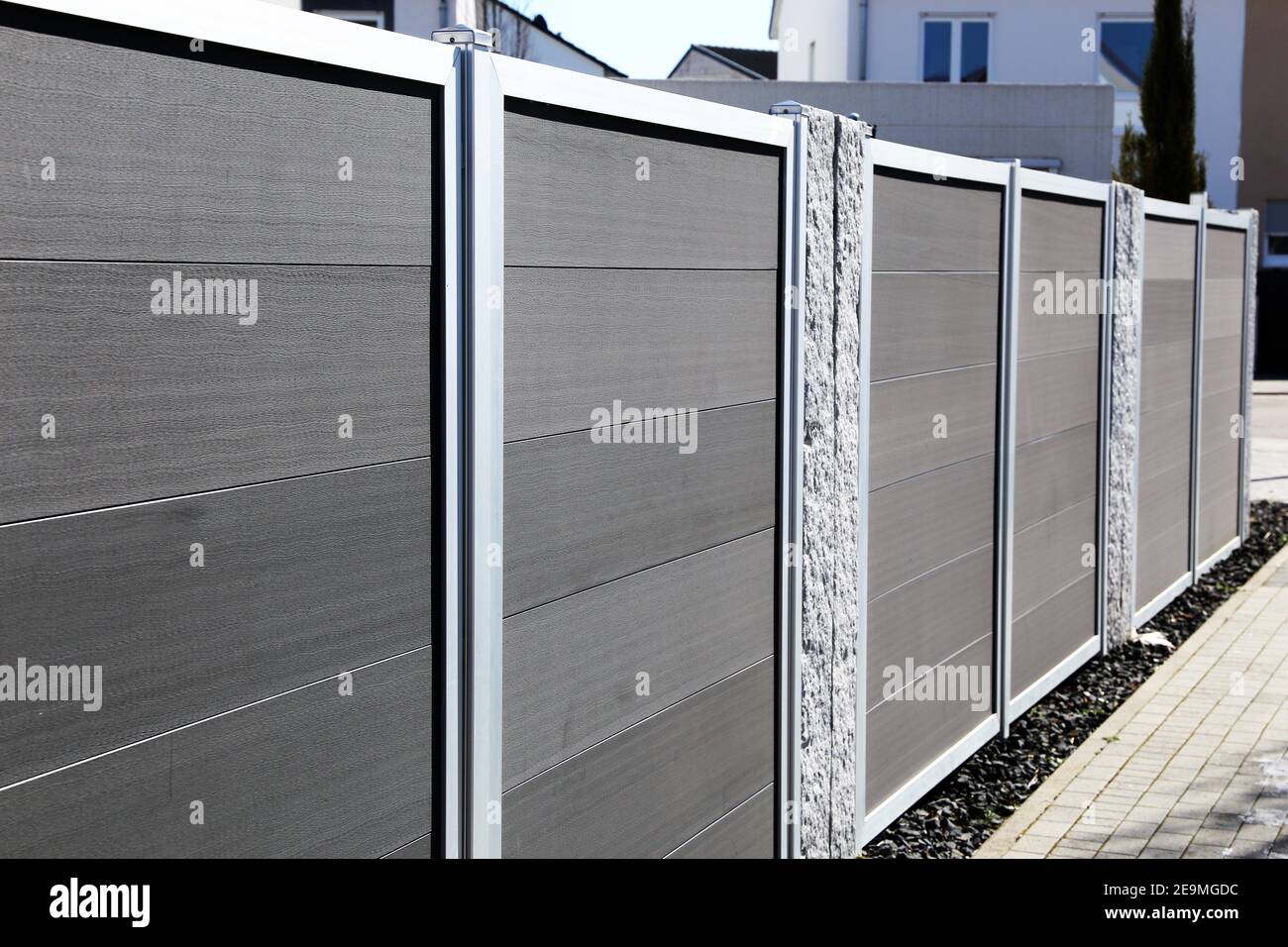 Modern new privacy fence as a boundary of the property Stock Photo - Alamy
