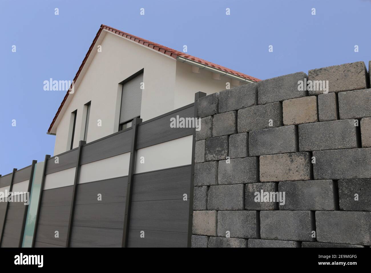 Modern new privacy fence as a boundary of the property Stock Photo - Alamy