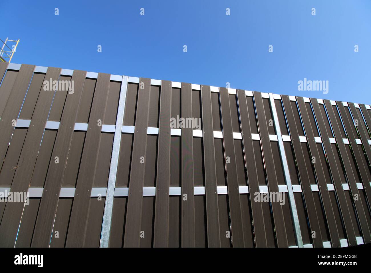 Modern new privacy fence as a boundary of the property Stock Photo - Alamy