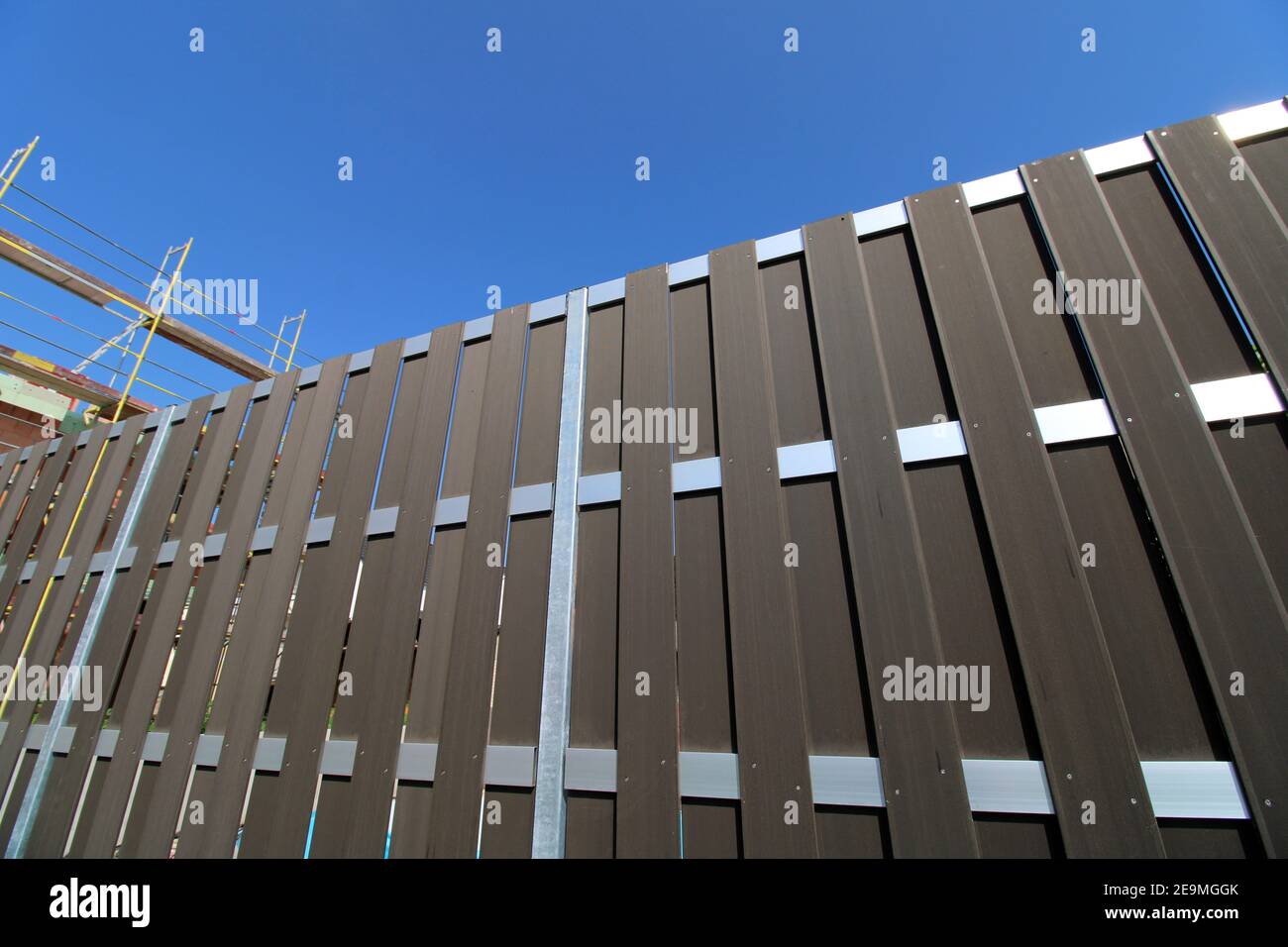 Modern new privacy fence as a boundary of the property Stock Photo - Alamy