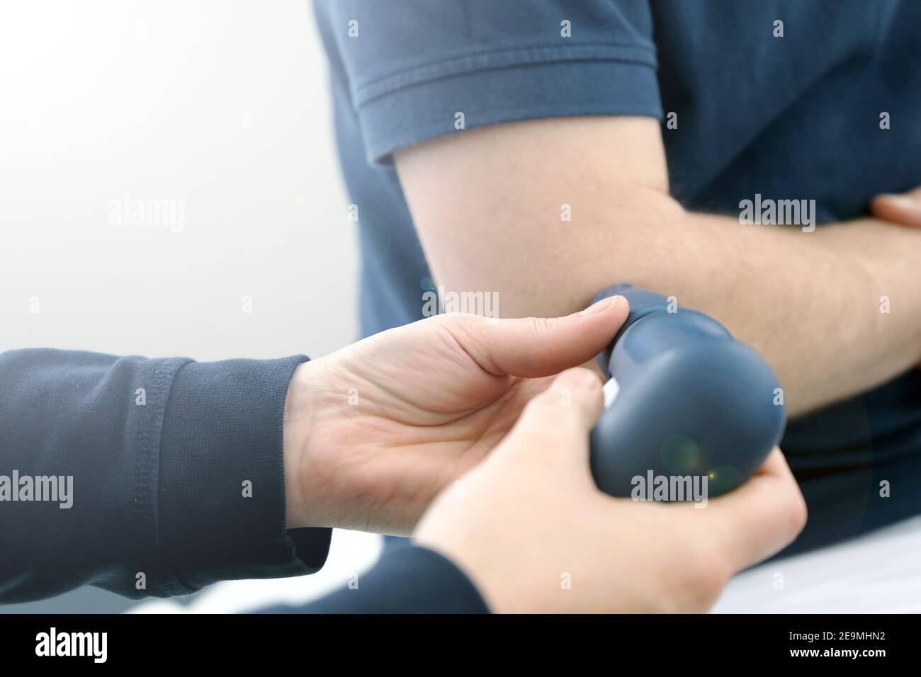 Shock wave therapy orthopedist hi-res stock photography and images - Alamy