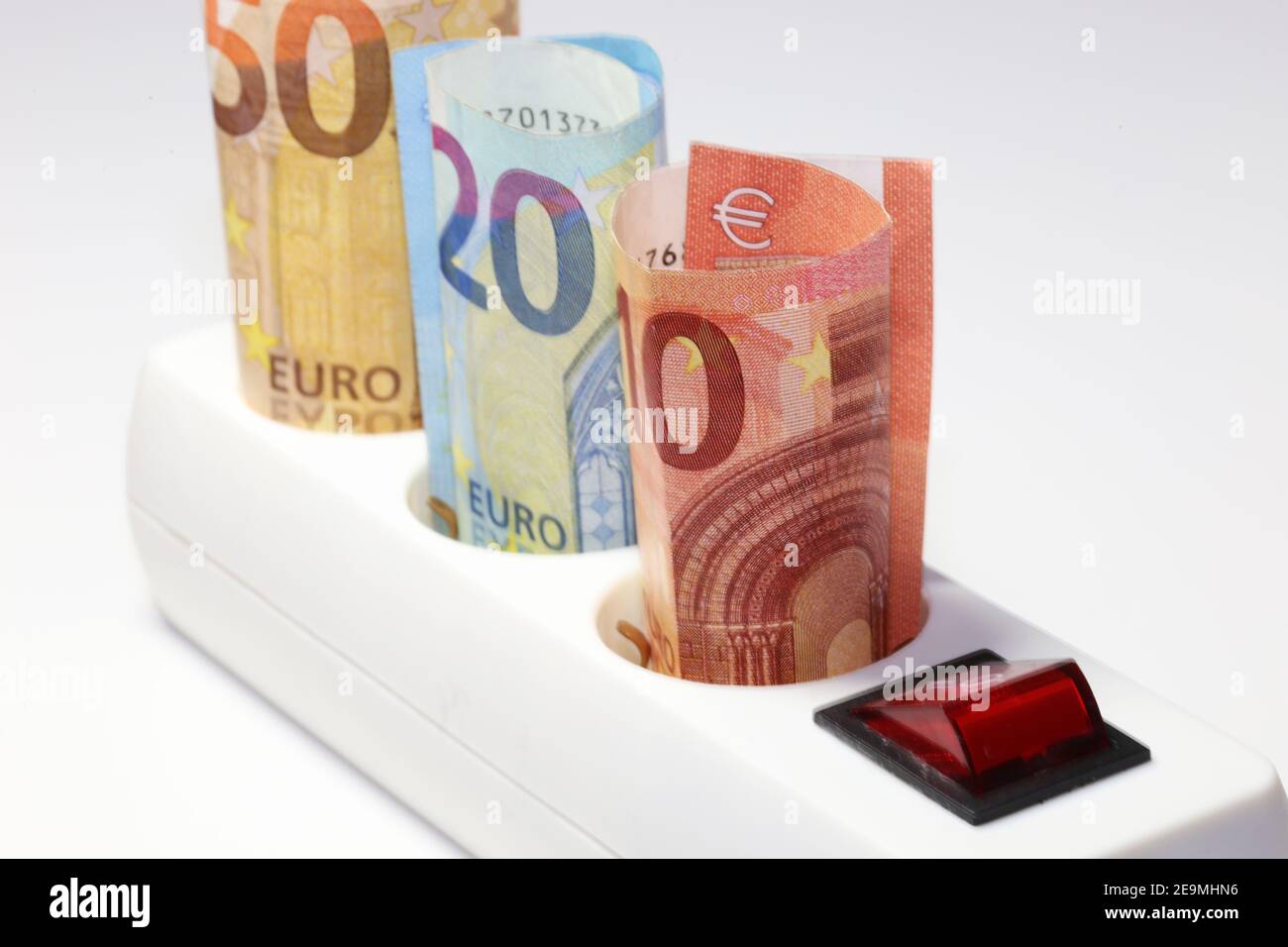 Symbol image electricity costs with european banknotes Stock Photo - Alamy