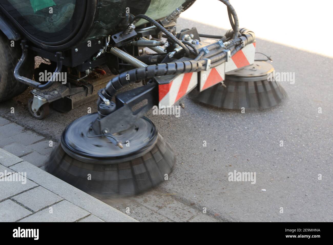 Street cleaning with sweeper Stock Photo - Alamy