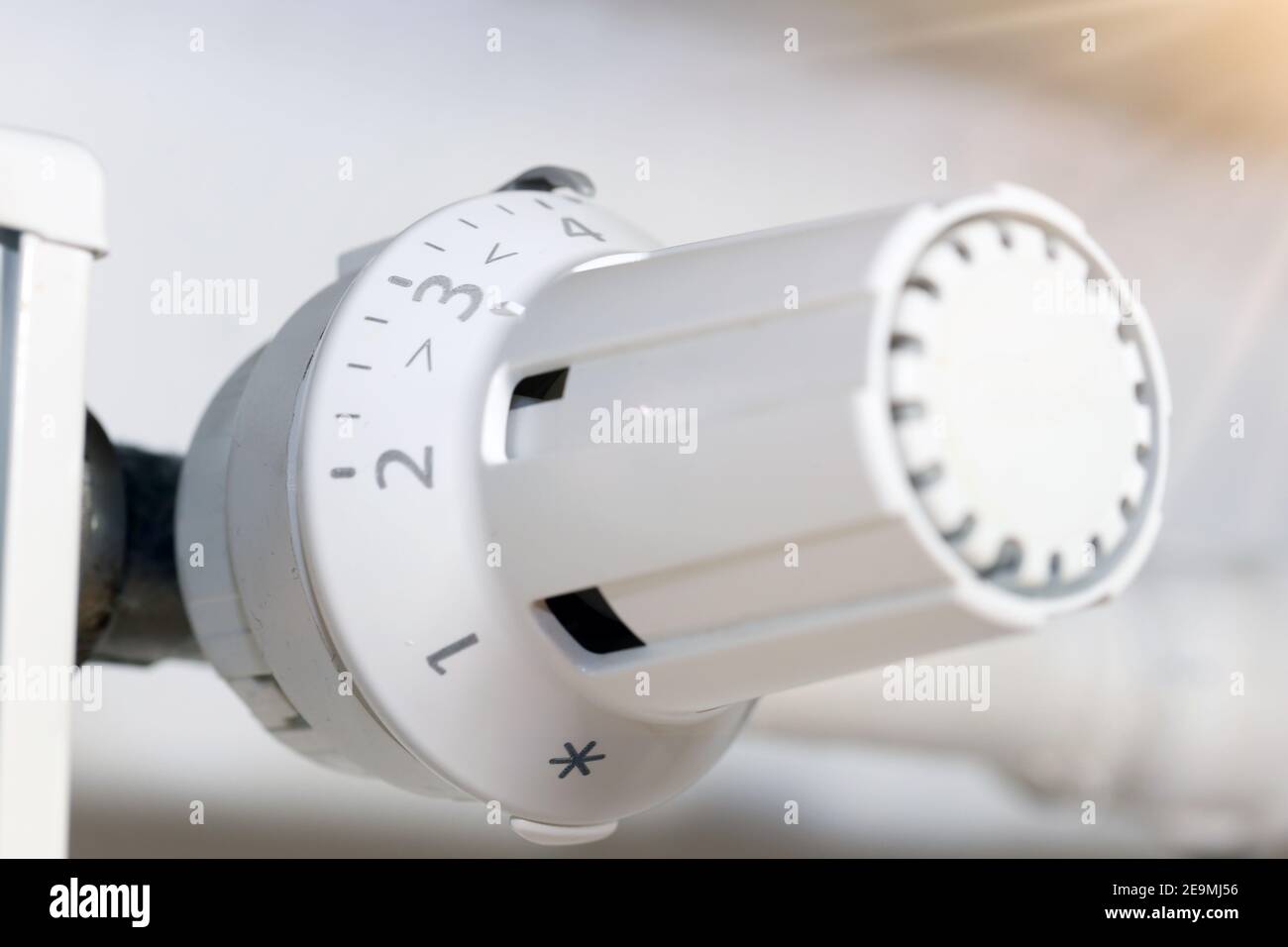 Close-up of a thermostat on a radiator Stock Photo - Alamy