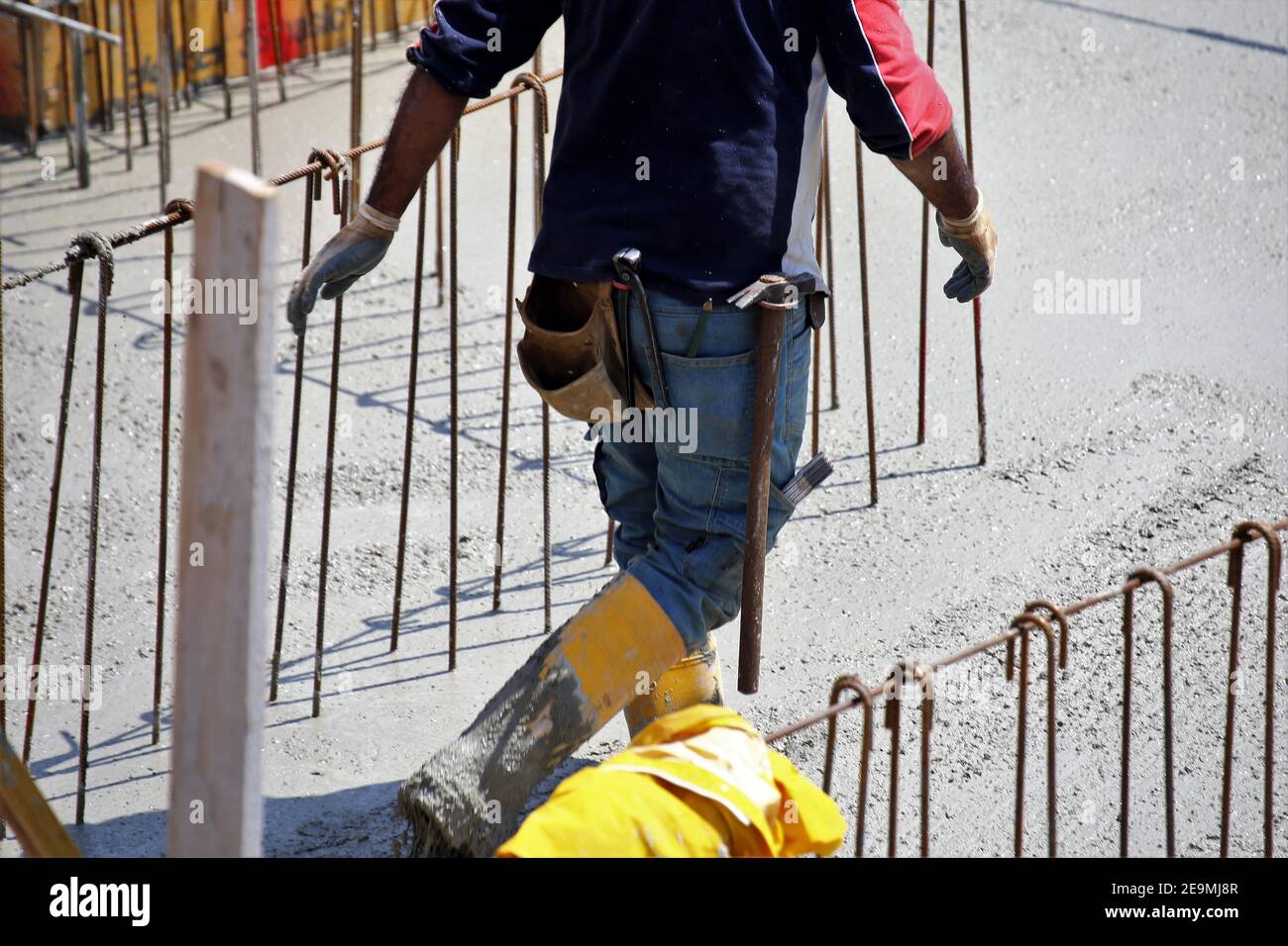 Concreting a base plate with ready-mixed concrete on the construction ...
