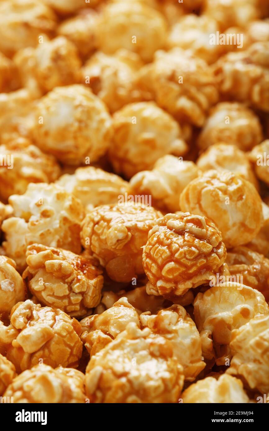 Caramel popcorn close-up as a background, full-screen texture ...
