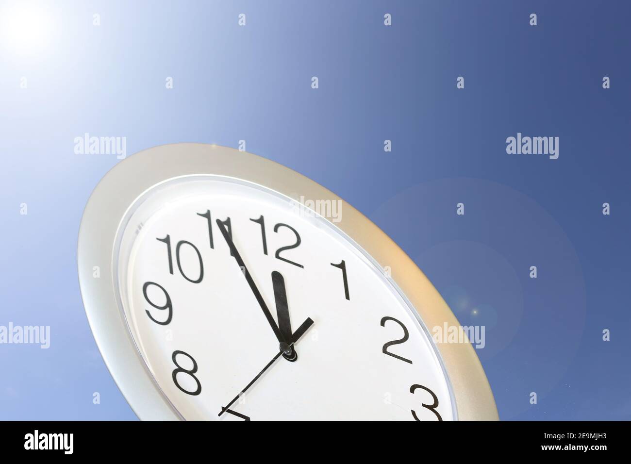 Symbol image Climate change : Clock shows five to twelve Stock Photo ...