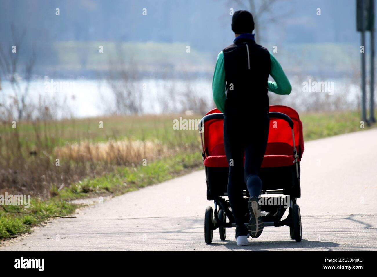 Young father stroller twins hi-res stock photography and images - Alamy