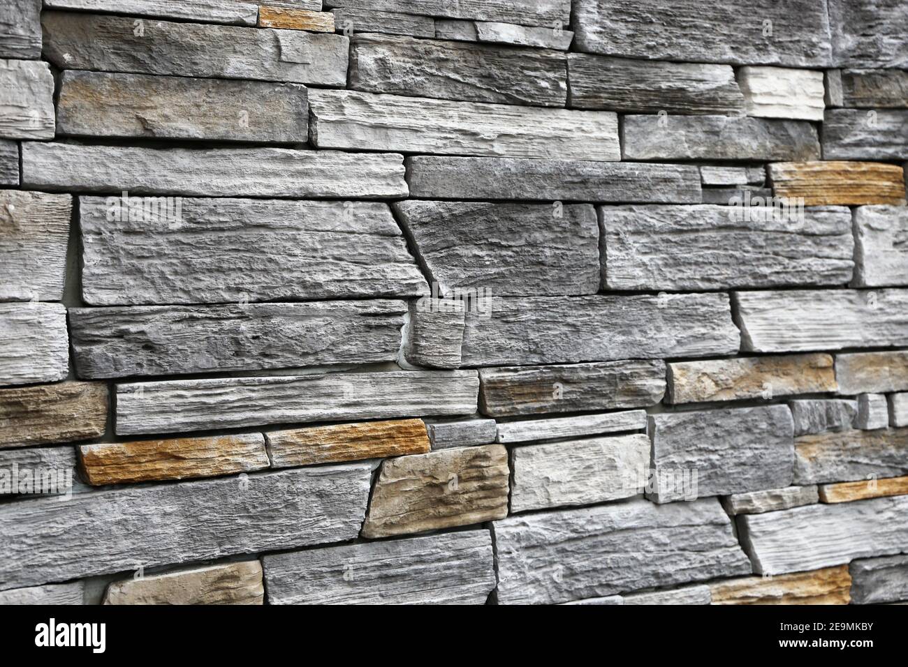 Masonry with natural stone cladding Stock Photo - Alamy