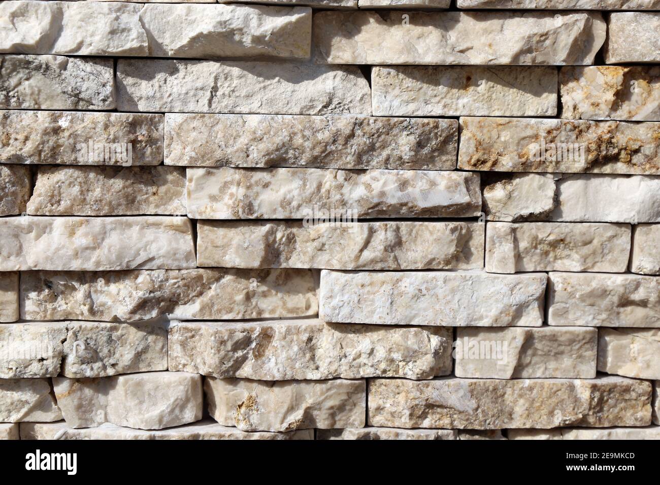 Masonry with natural stone cladding Stock Photo - Alamy