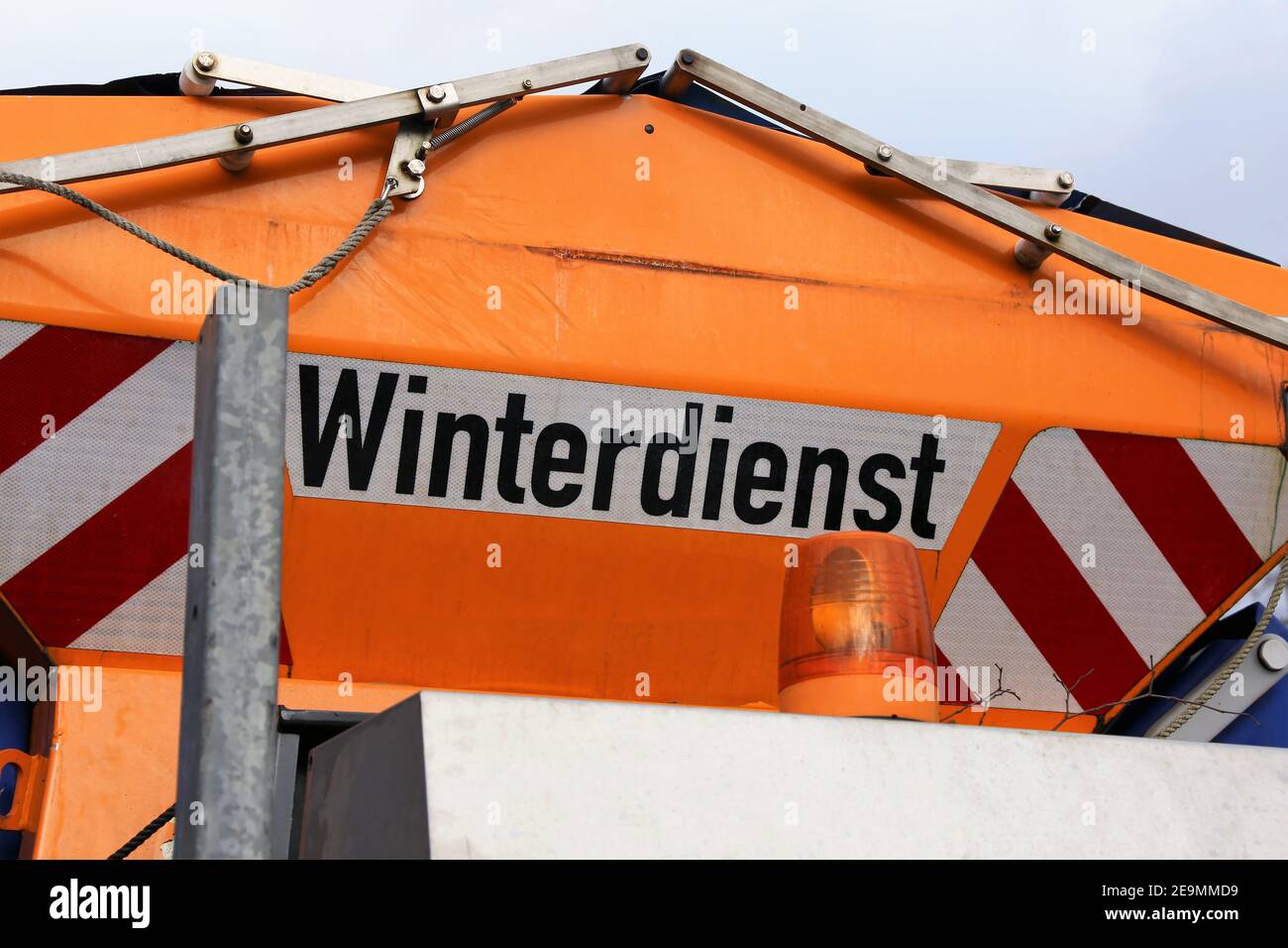 Snow control truck in Germany with sign „snow plowing service ...
