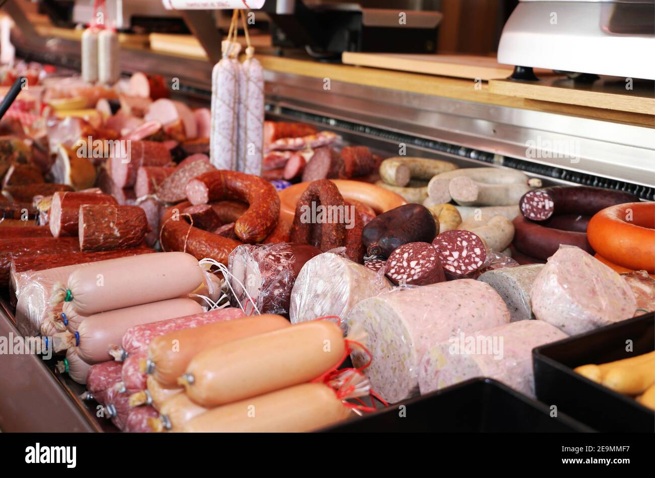 Sausage counter in a butcher's shop Stock Photo - Alamy