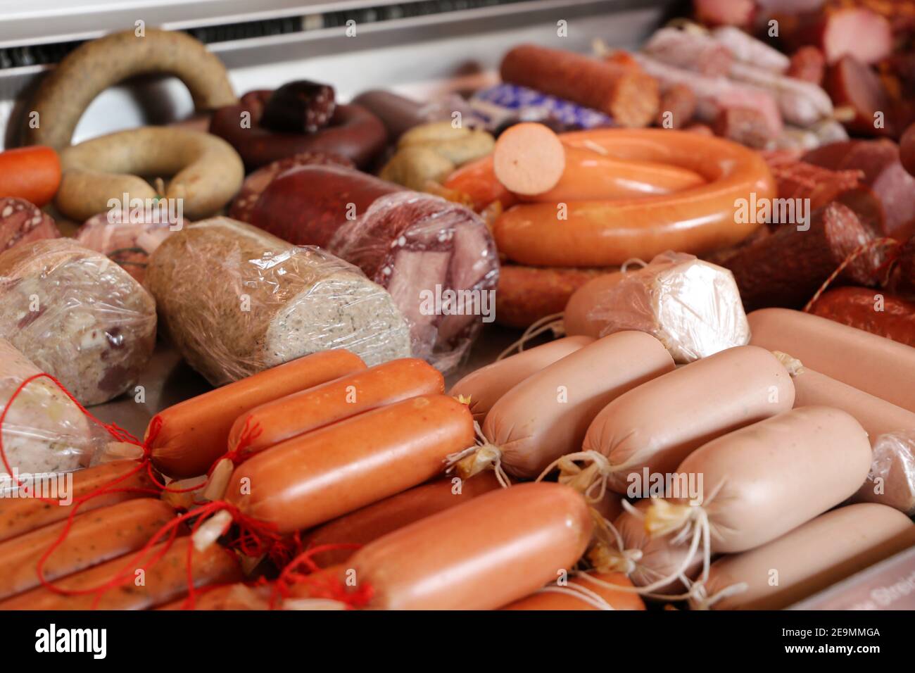 Sausage counter in a butcher's shop Stock Photo - Alamy