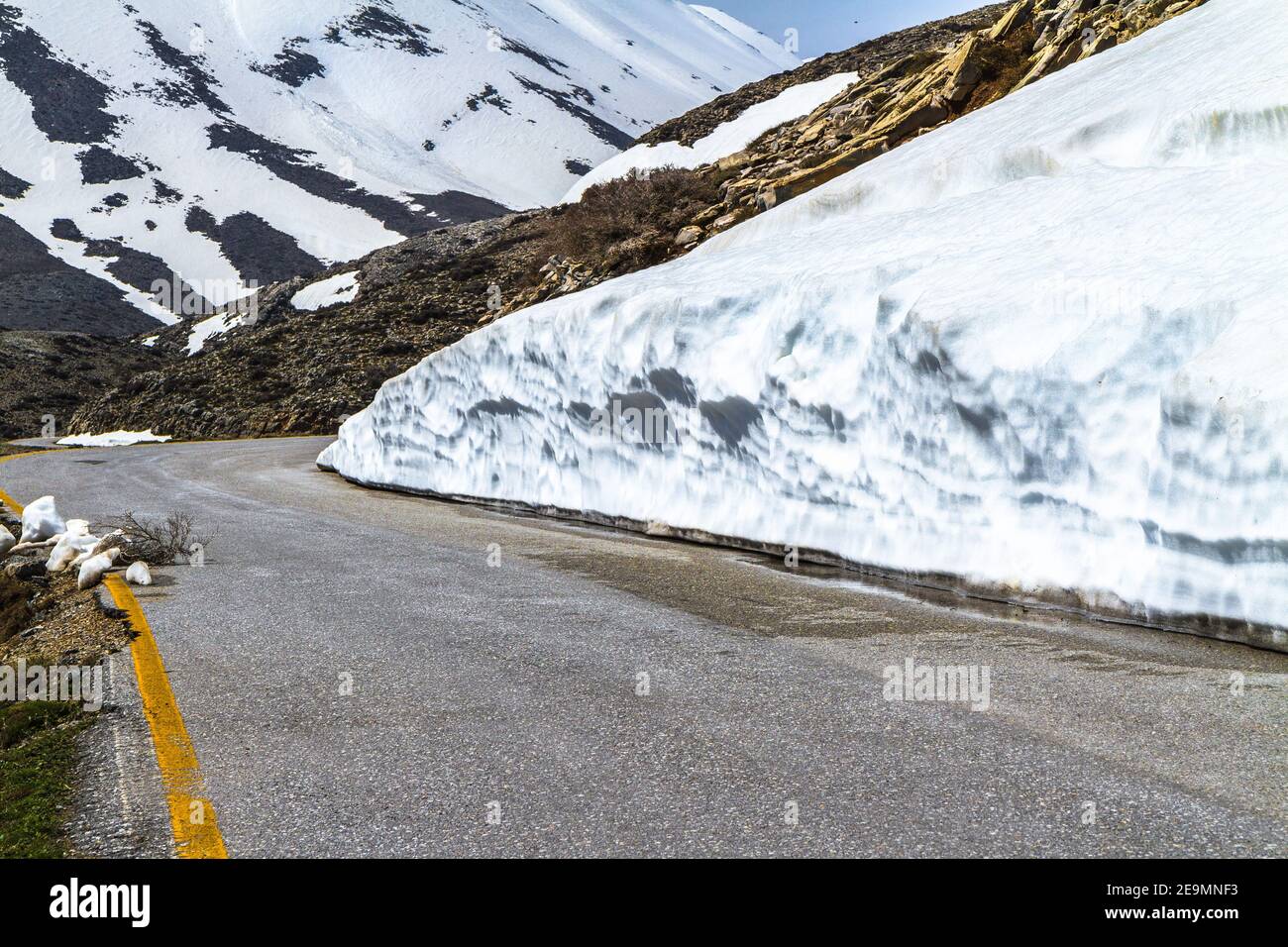 Mountains road wonderland, stunning steep slopes, cliffs and snow ...