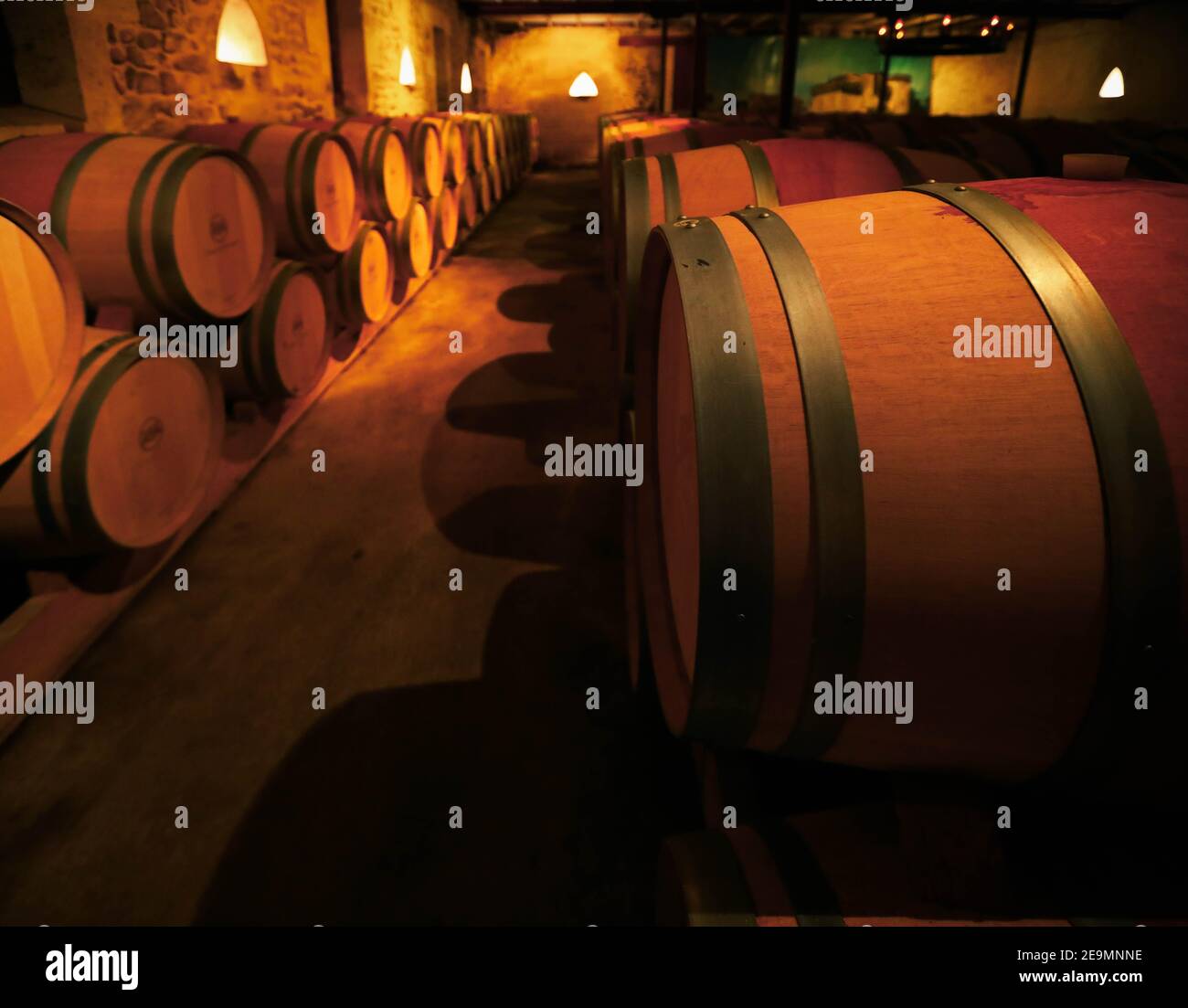 Wooden barrels for wine aging in the cellar Stock Photo - Alamy