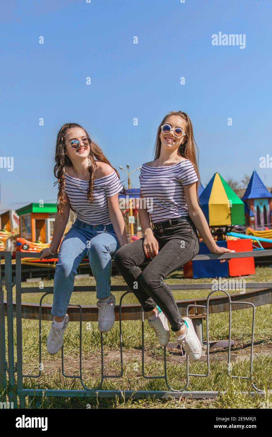 Gen z girls enjoying outdoors, expressing positive emotions. Outdoor ...