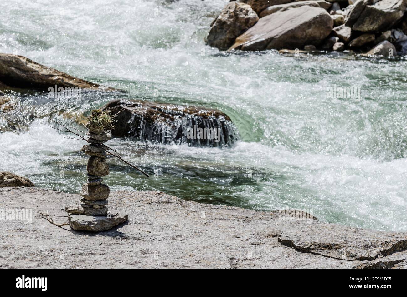 stack stones at the creek in the sun Stock Photo - Alamy