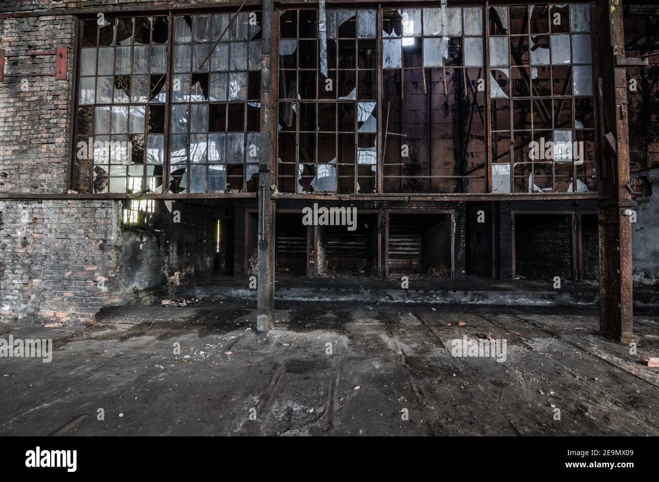 abandoned old factory with broken windows Stock Photo - Alamy