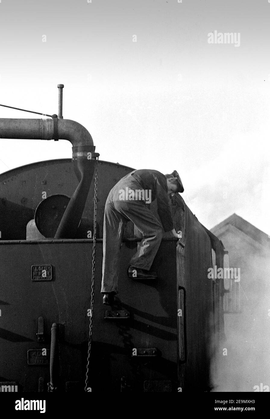 British Railways worker on Steam Locomotive Wolverhampton 1967 Stock ...