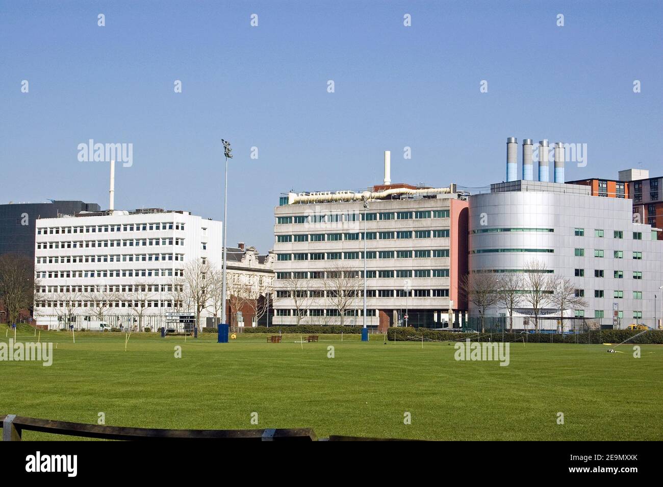 View across playing fields towards the more modern buildings of ...
