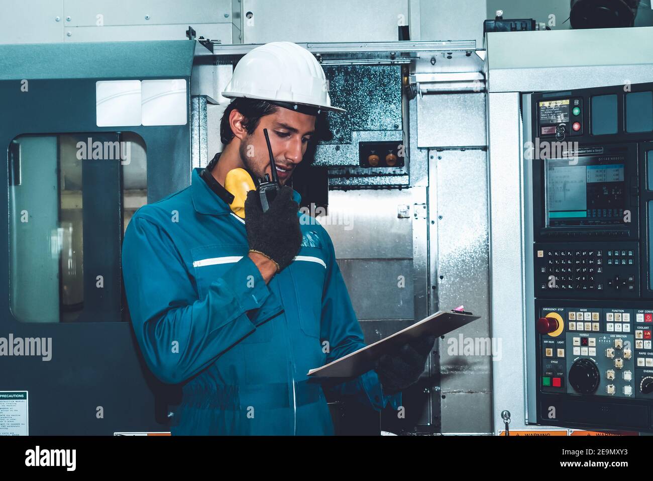 Technician operating lathe cutting machine hi-res stock photography and ...