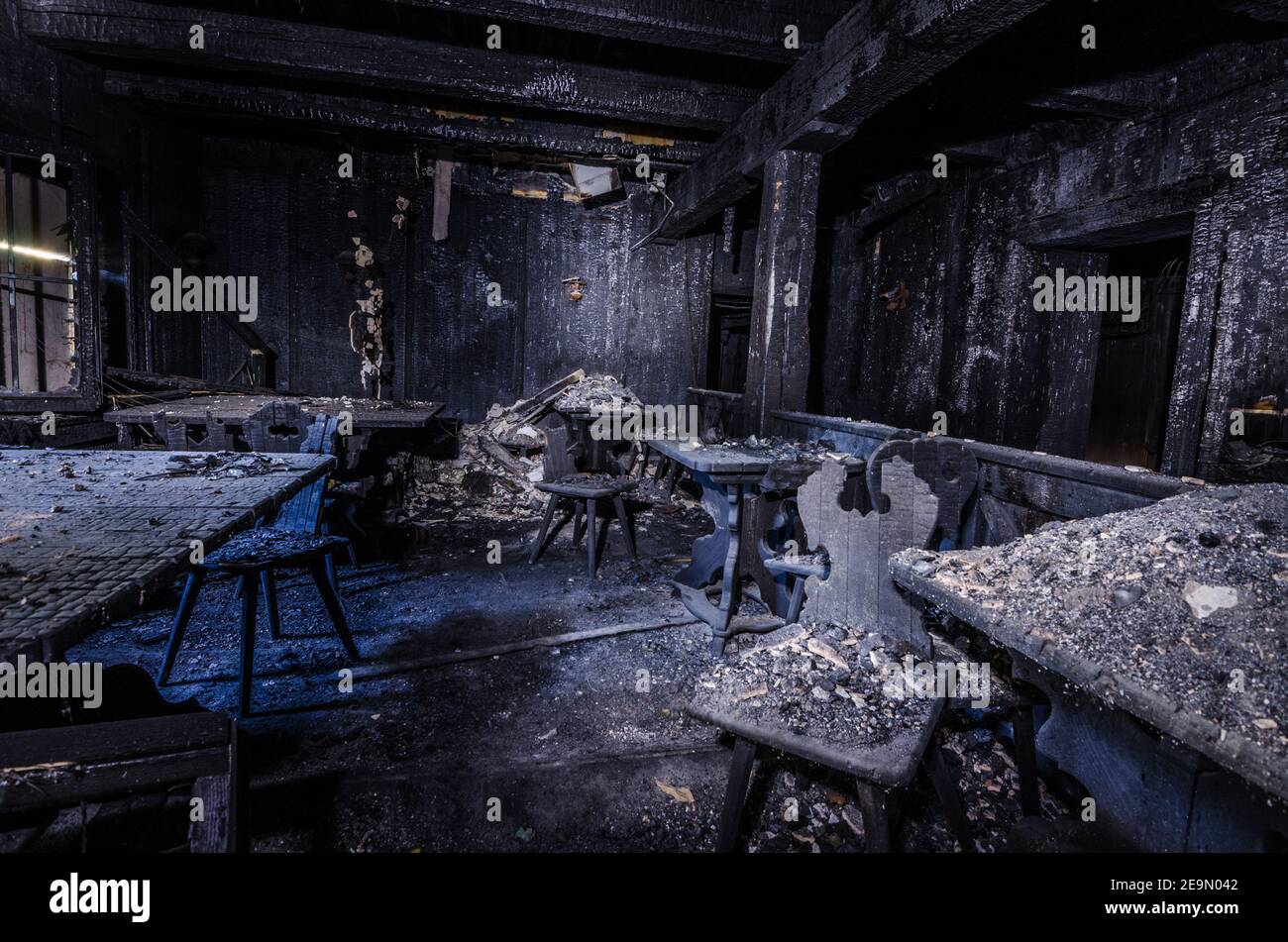 guest rooms with tables and chairs after great fire Stock Photo - Alamy