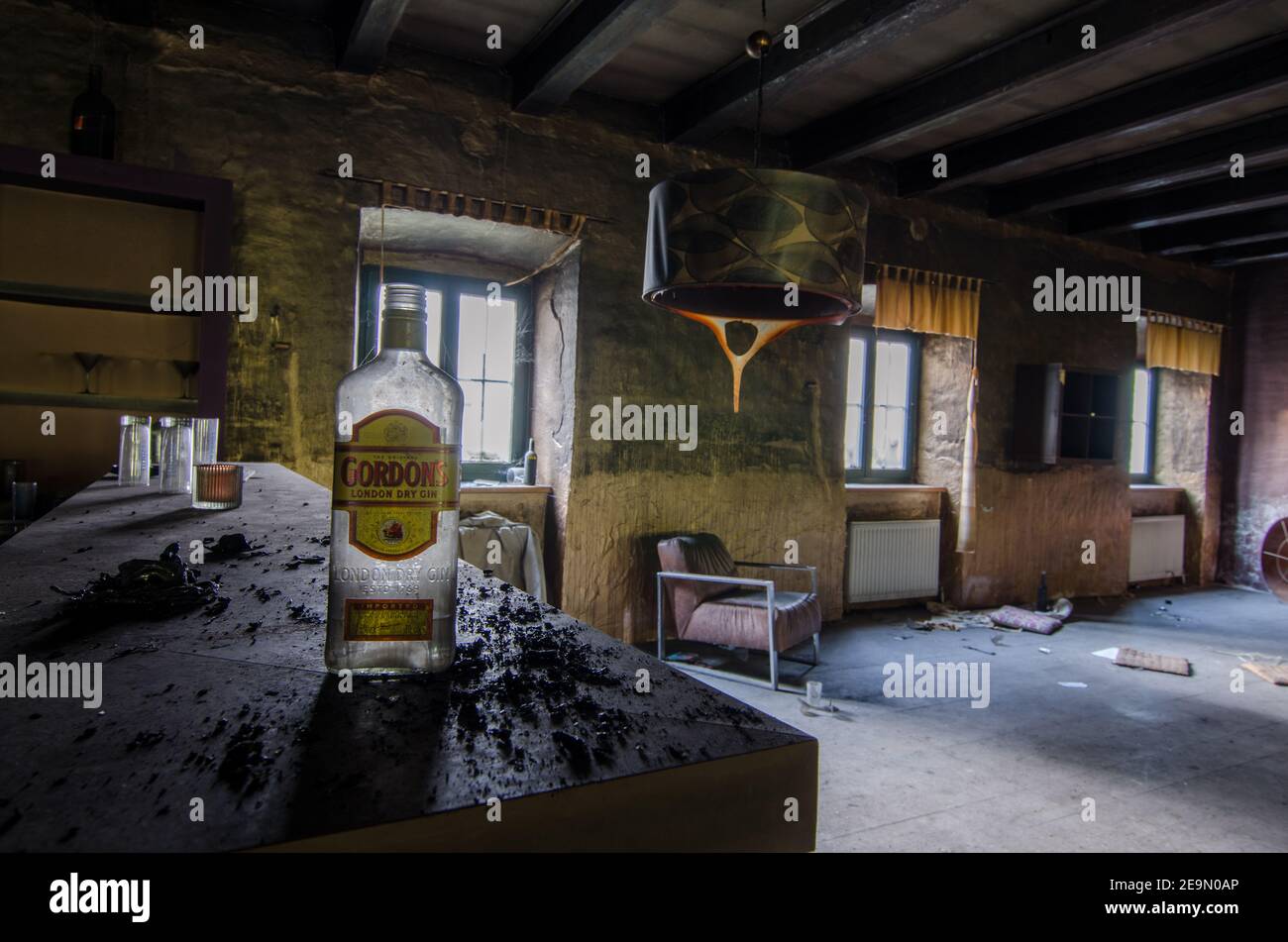 bottles in old abandoned inn Stock Photo - Alamy