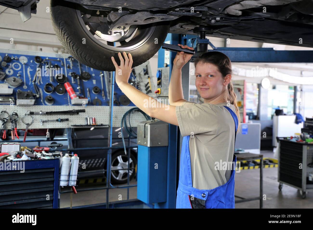 Symbol image: Woman in male-dominated profession: Car mechanic (model ...