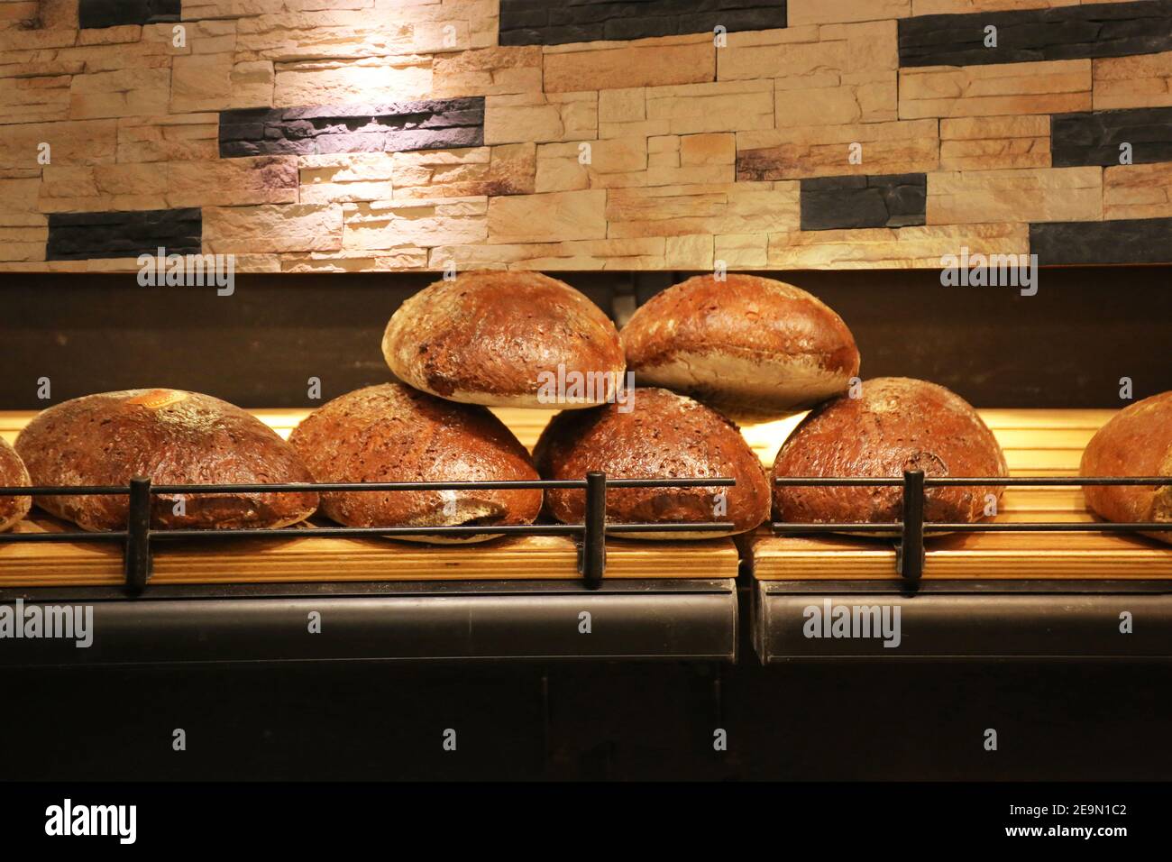 Bakery counter with fresh and crusty bread Stock Photo - Alamy