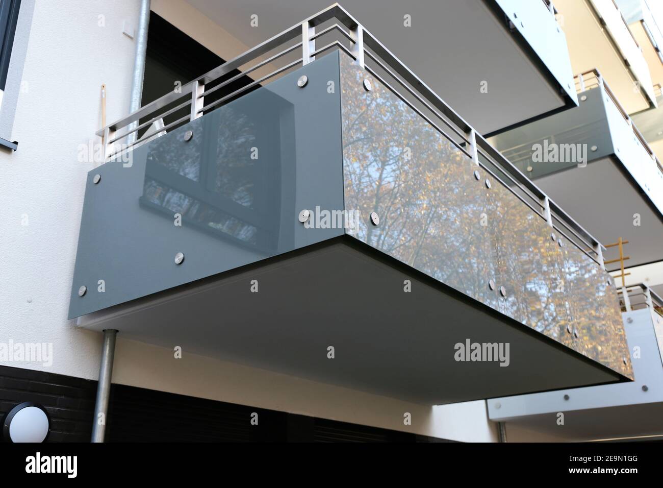 Balconies on a large apartment building Stock Photo - Alamy