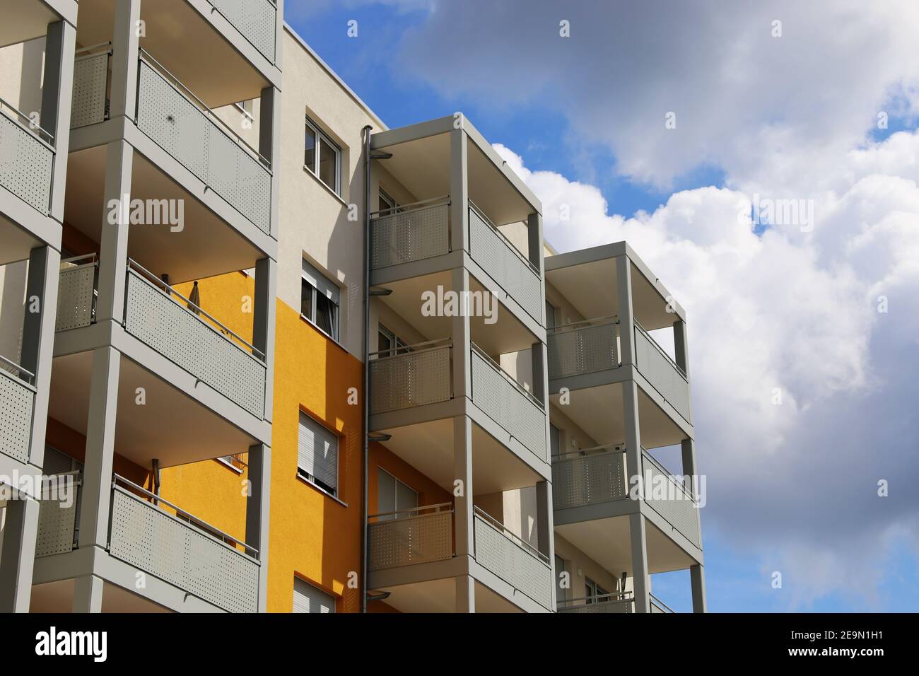 Balconies on a large apartment building Stock Photo - Alamy