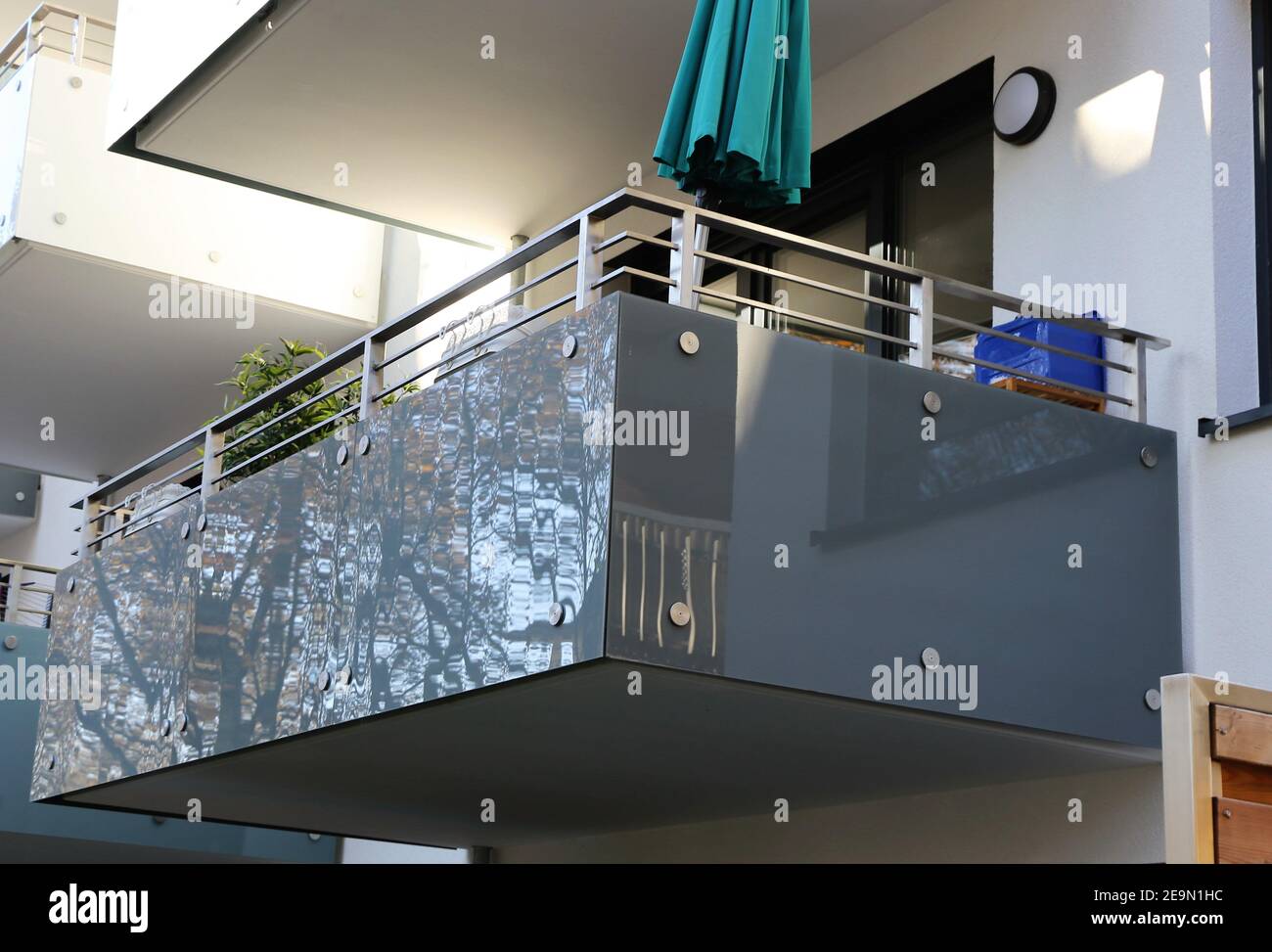 Balconies on a large apartment building Stock Photo - Alamy