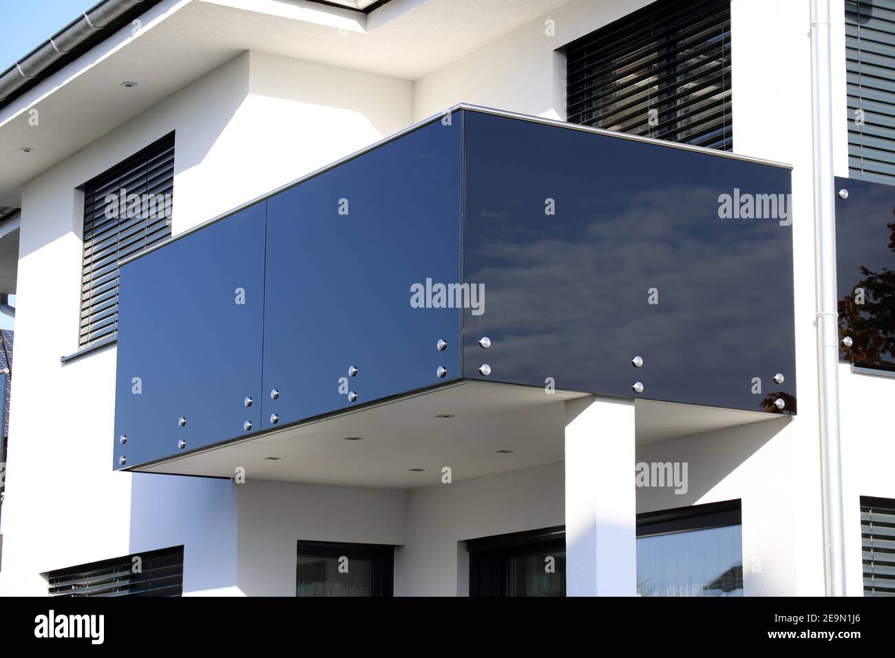 Black balcony railing made of glass and stainless steel Stock Photo - Alamy