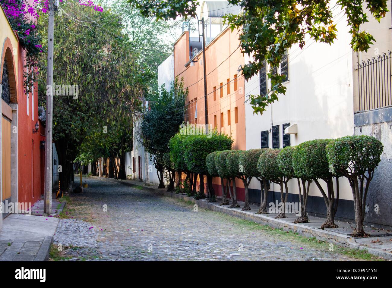 Colorful Hispanic houses in empty alley from Mexico City Stock Photo ...