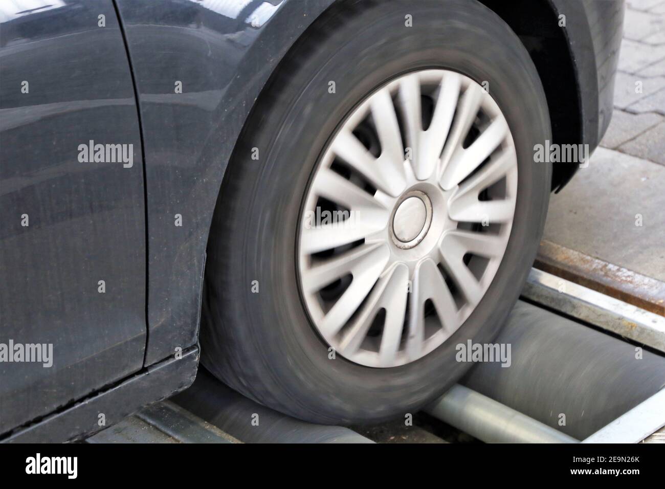 Car on the brake test bench (brake test Stock Photo - Alamy