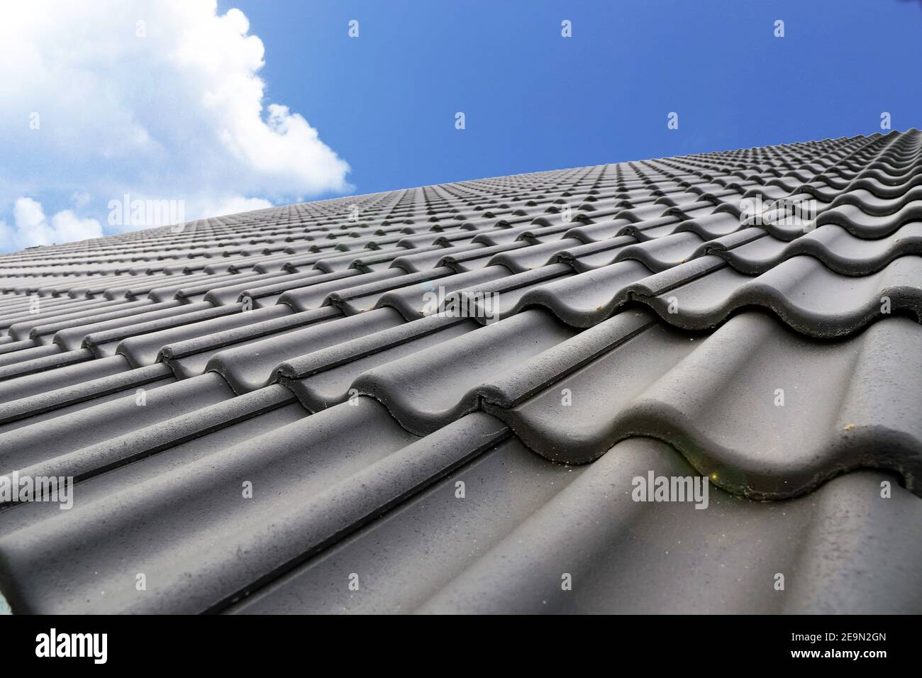 New tile roof on a residential house Stock Photo - Alamy