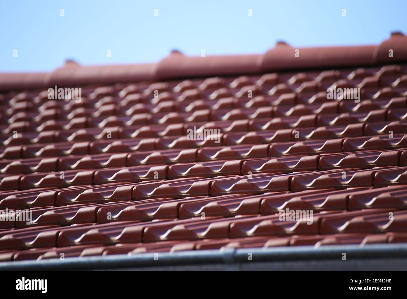 New tile roof on a residential house Stock Photo - Alamy