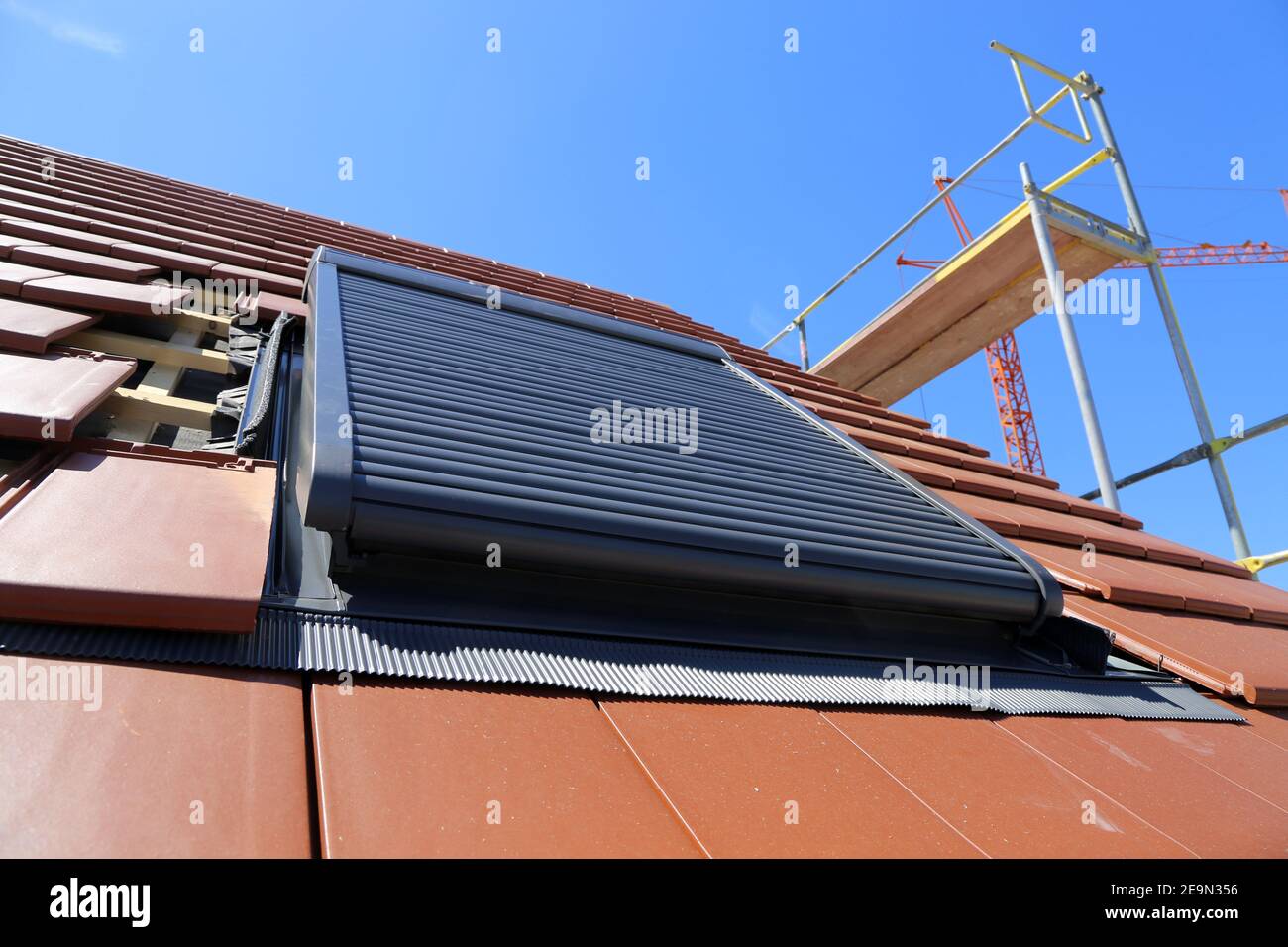 Roof window with roller shutter Stock Photo - Alamy