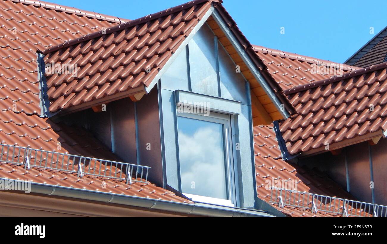 New tiled roof with dormers Stock Photo - Alamy