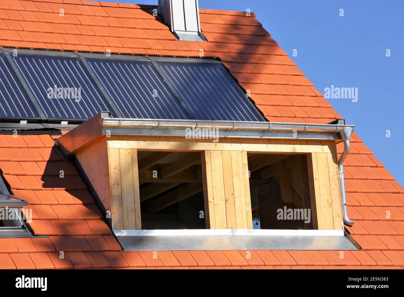 New roof with dormer under construction Stock Photo - Alamy
