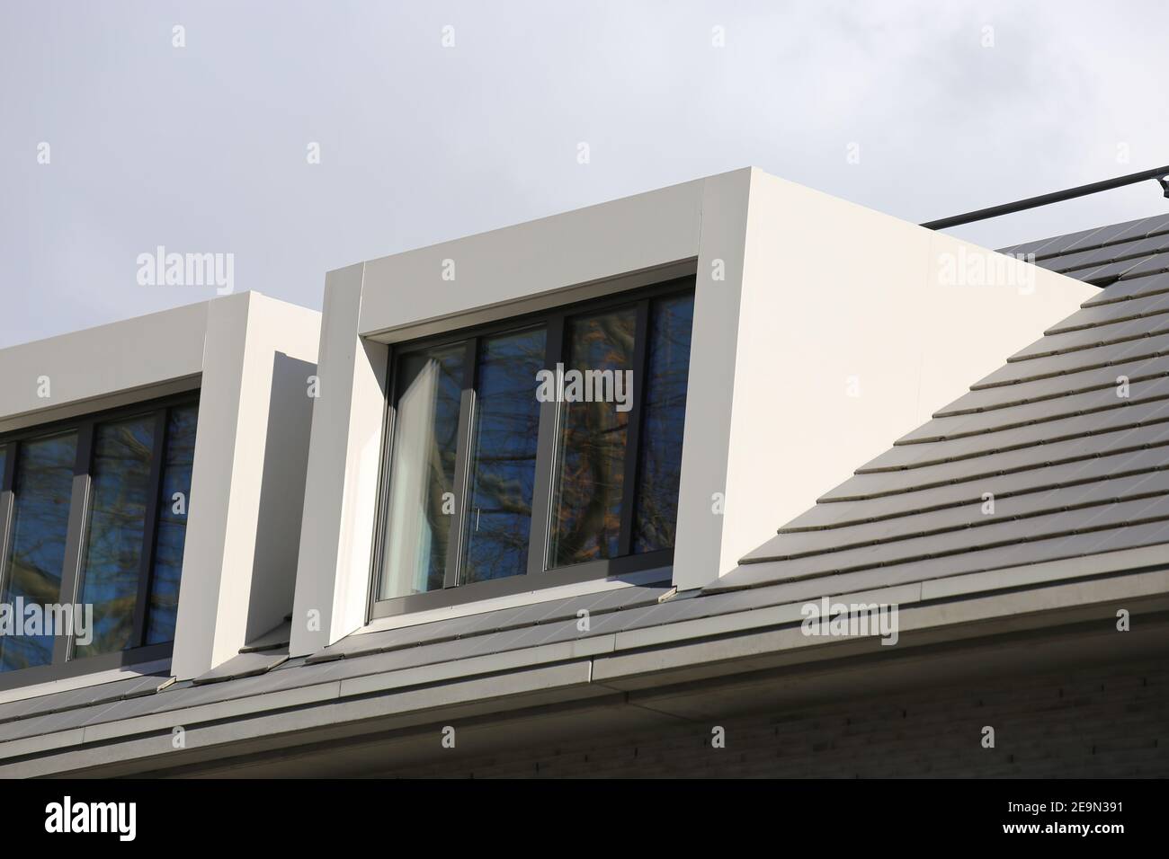 New tiled roof with dormers Stock Photo - Alamy