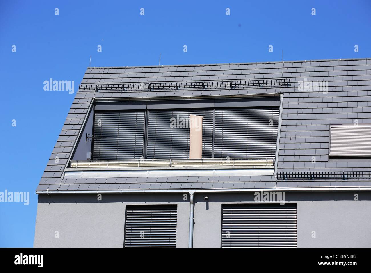 Large dormer with modern shutter Stock Photo - Alamy