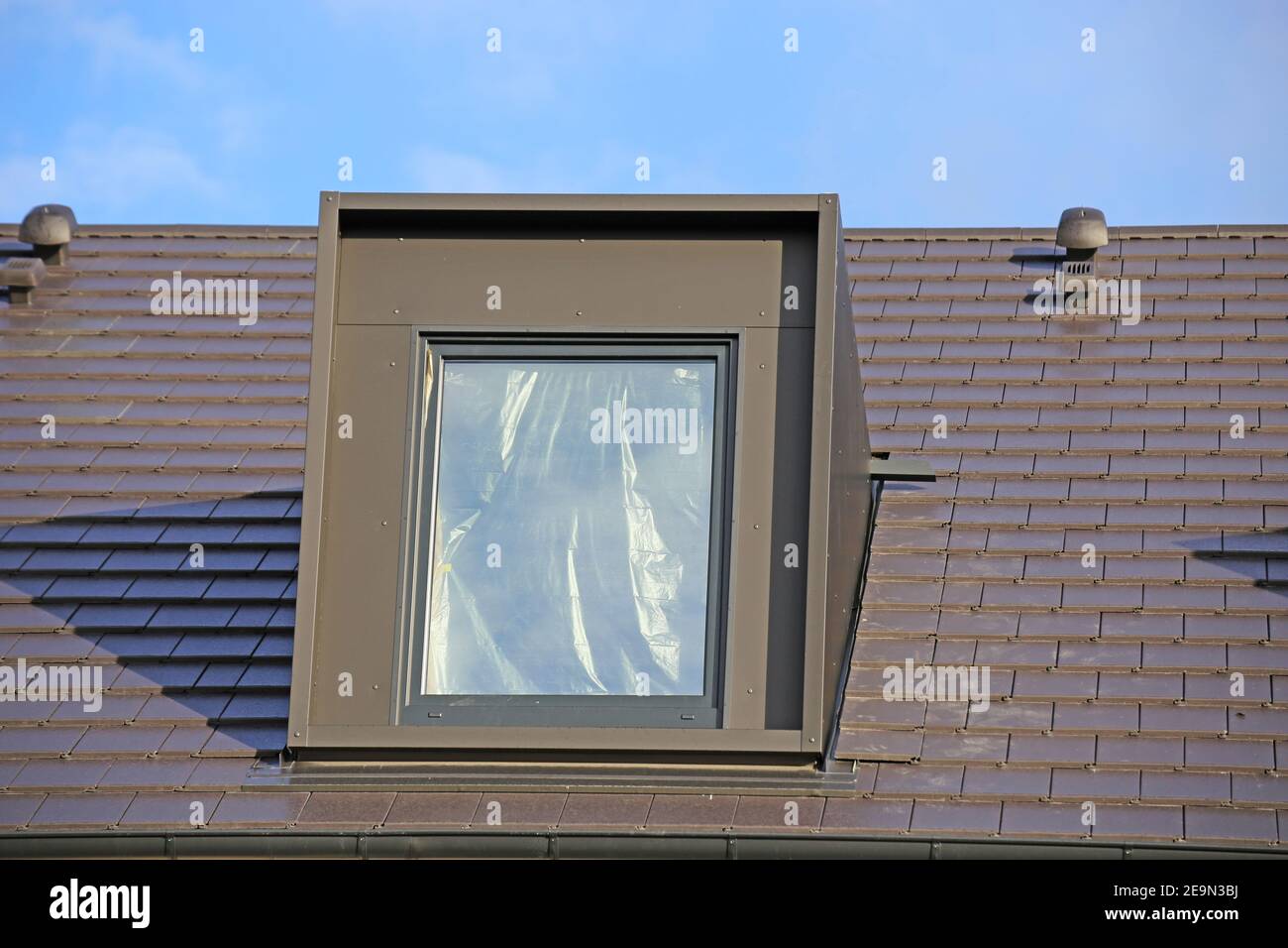 Dormer with zinc cladding on a tiled roof Stock Photo - Alamy
