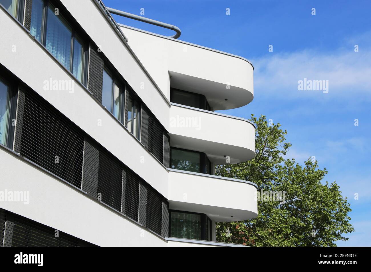 Modern apartment building in urban style Stock Photo - Alamy