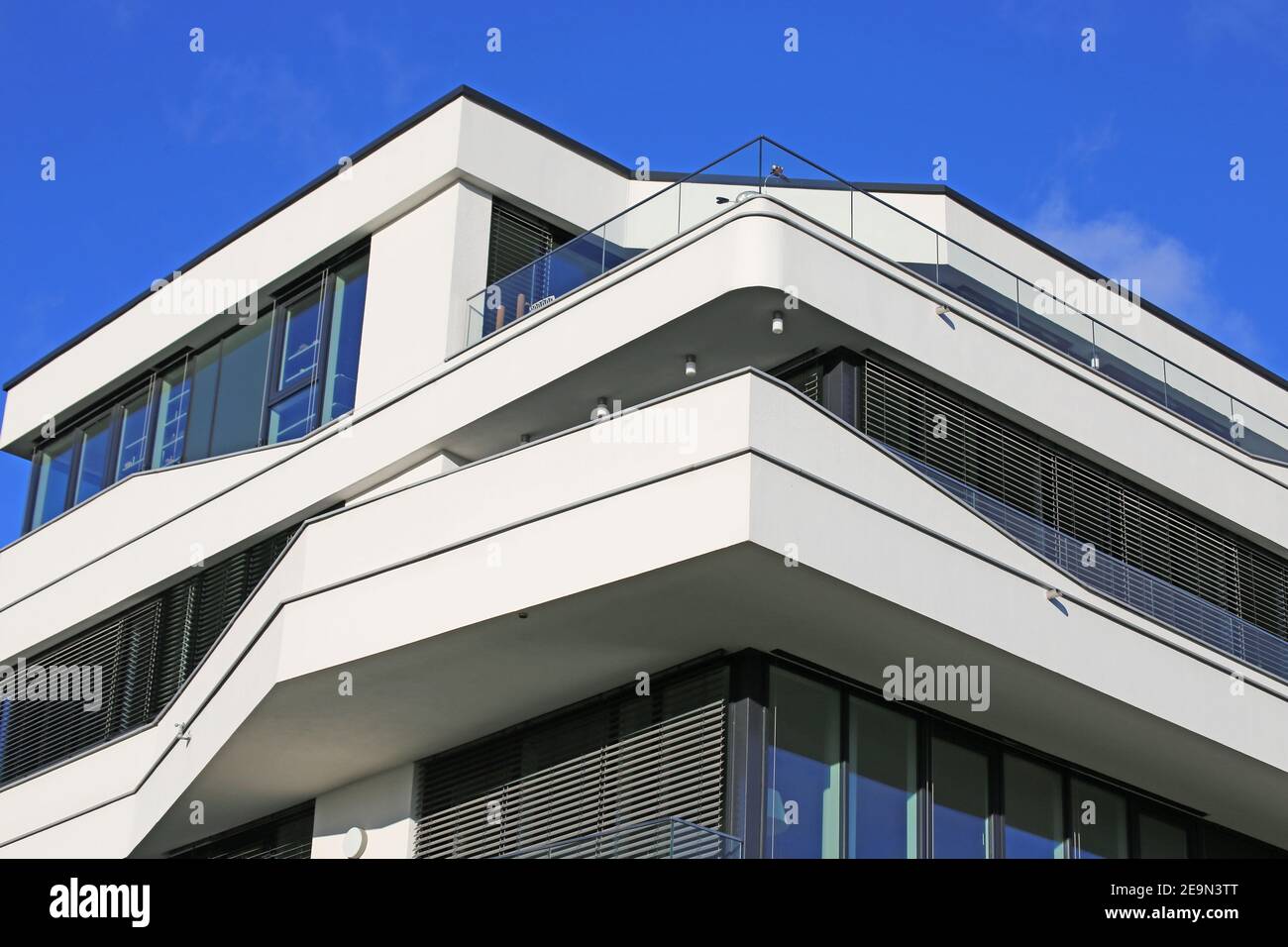 Modern apartment building in urban style Stock Photo - Alamy