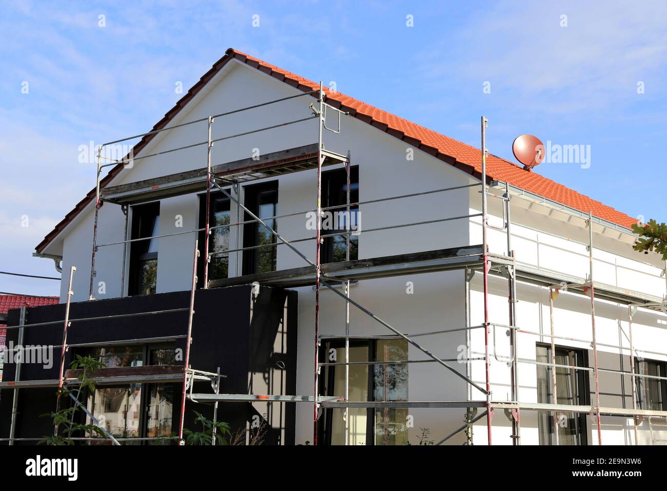 Residential house with new facade painting (Germany Stock Photo - Alamy
