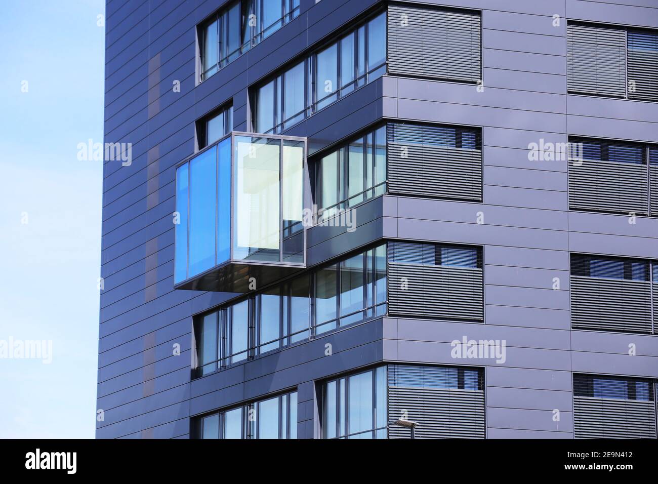 Modern building with facade cladding Stock Photo - Alamy