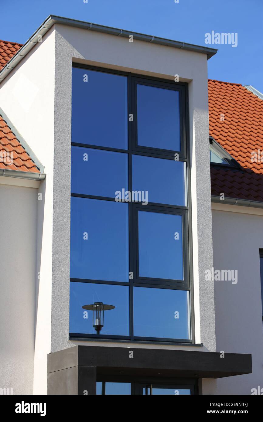Large window facade on a modern building Stock Photo - Alamy