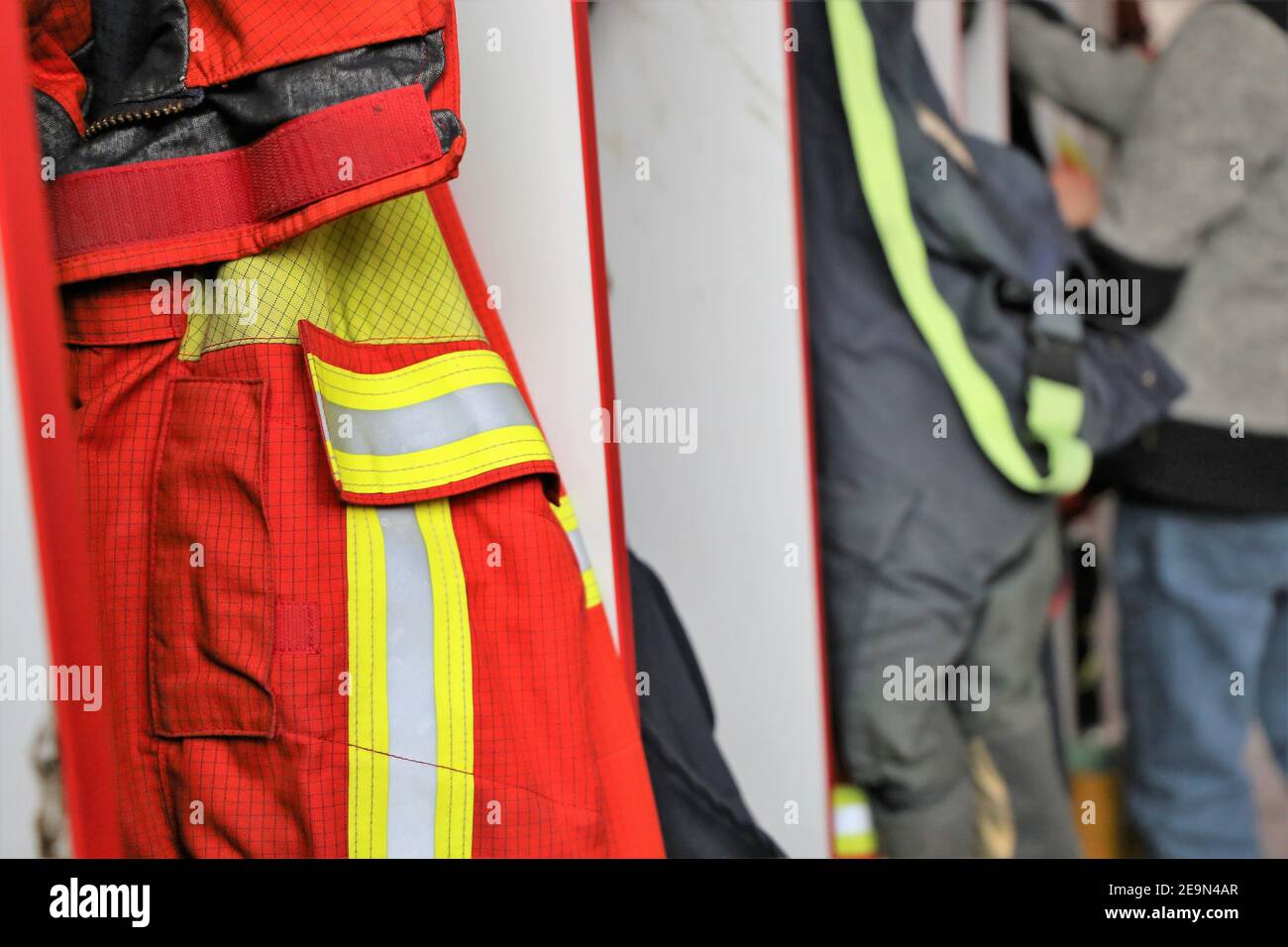 Detail of clothing in a fire station Stock Photo - Alamy
